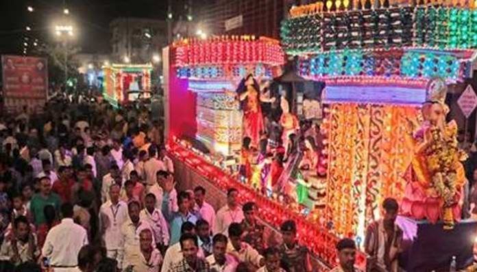 The sequence of Jhanki coming out on Anant Chaturdashi in Indore is ...